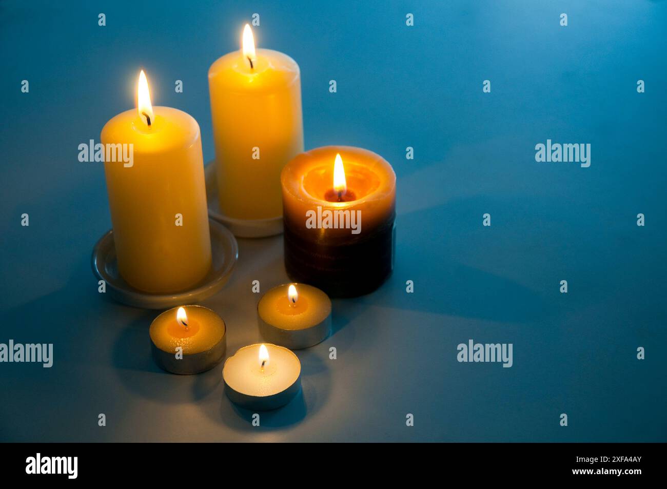Lit up candles Stock Photo - Alamy