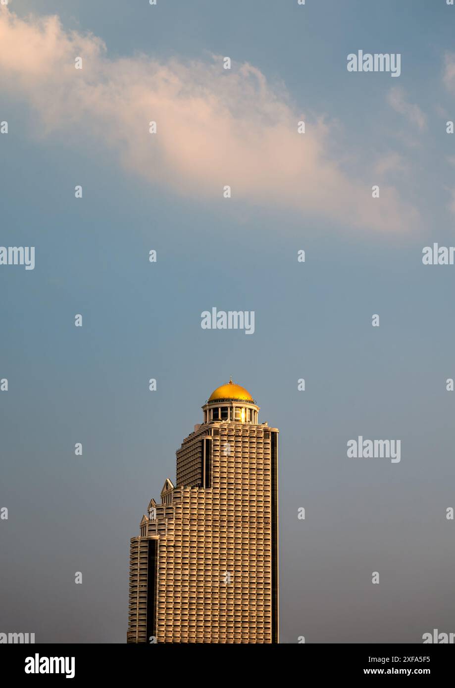 Single retro golden dome high-rise condominium with many balcony layer ...