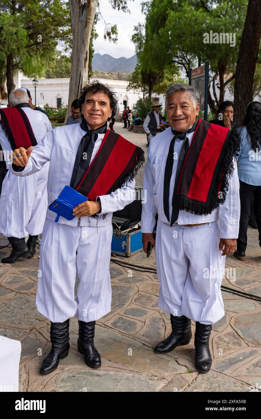 Gaucho singers in traditional outfits perform in the plaza at the ...