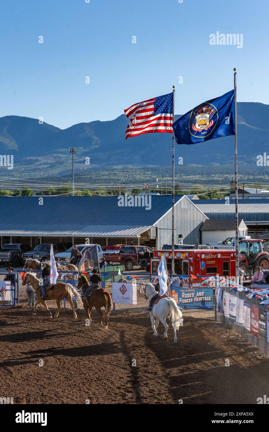 Young cowboys & cowgirls ride past the U.S. and Utah state flags during ...