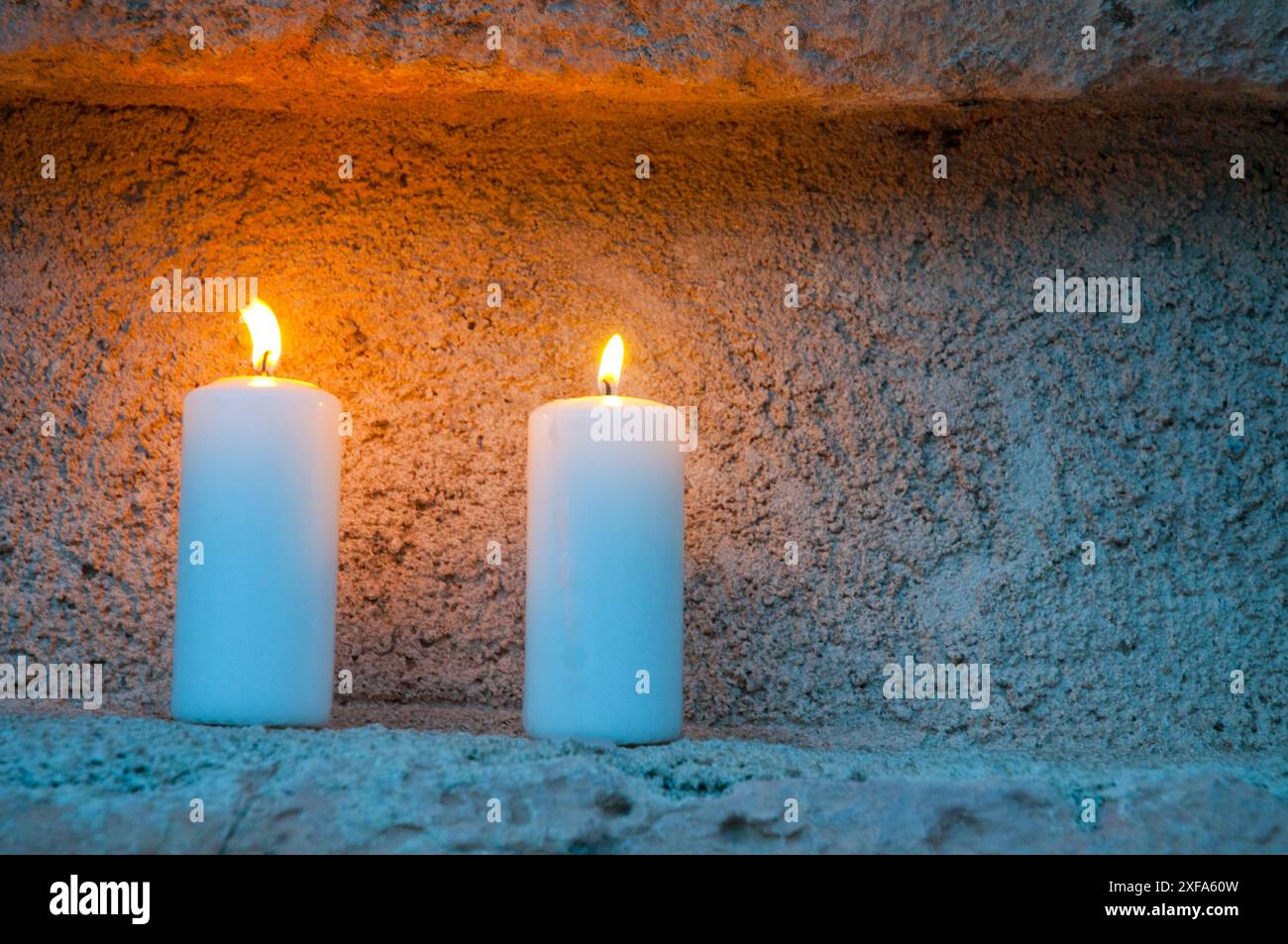 Two lit candles. Concierto de las Velas, Pedraza, Segovia province ...