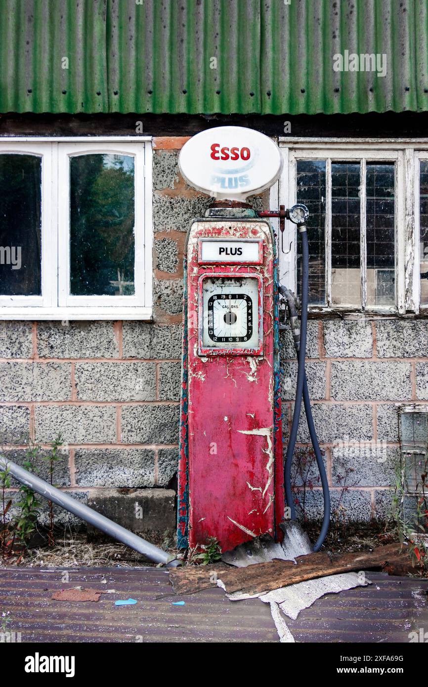 old vintage esso petrol pump outside garage UK Stock Photo - Alamy
