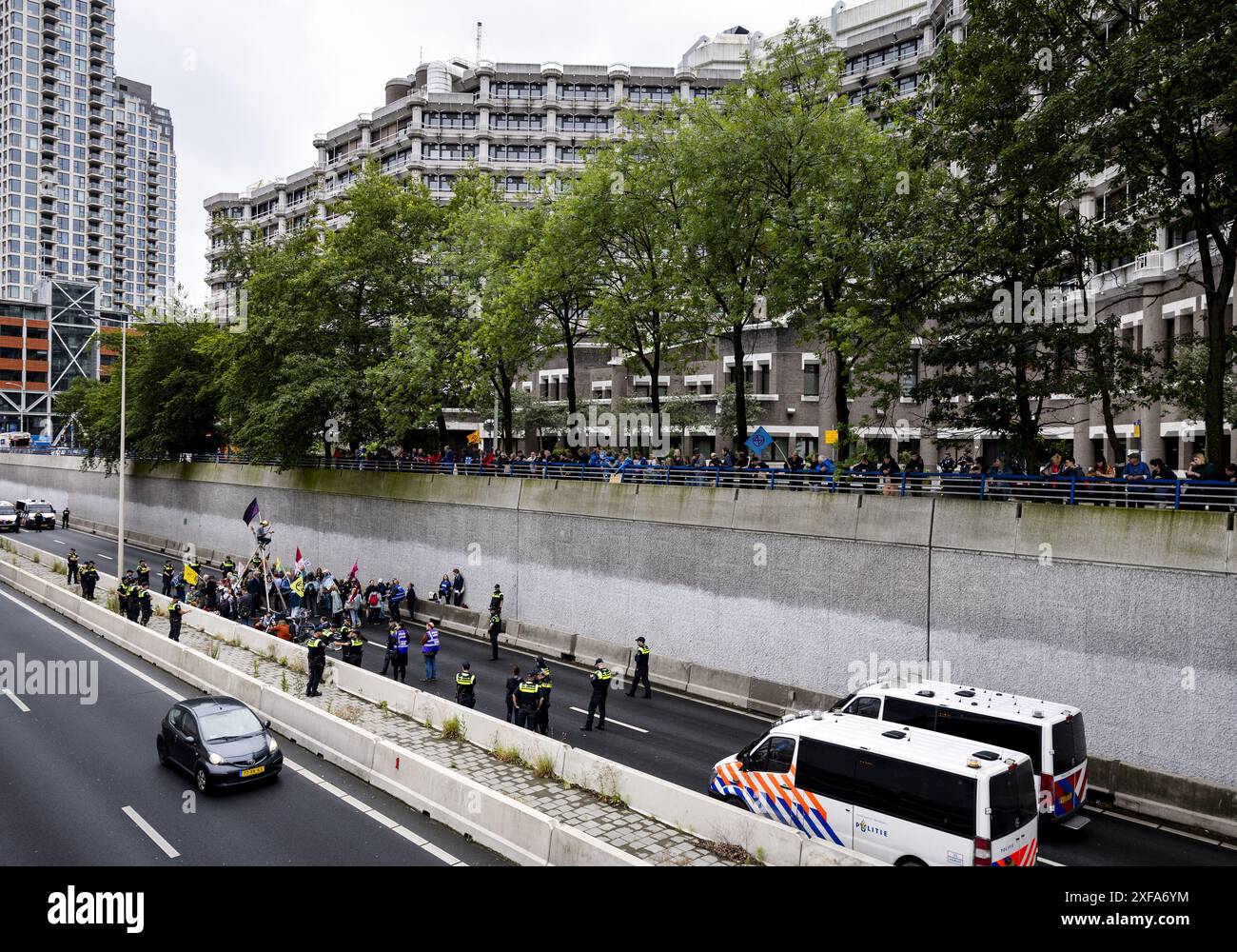 THE HAGUE - Protesters from Extinction Rebellion (ER) block the A12 on ...
