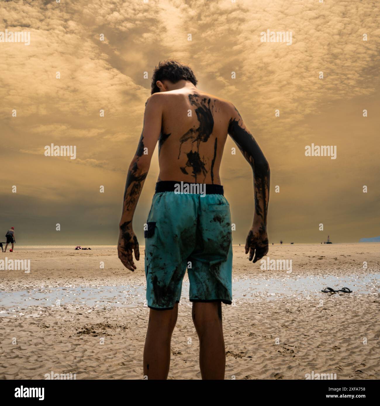 Boy covered in oil hi-res stock photography and images - Alamy