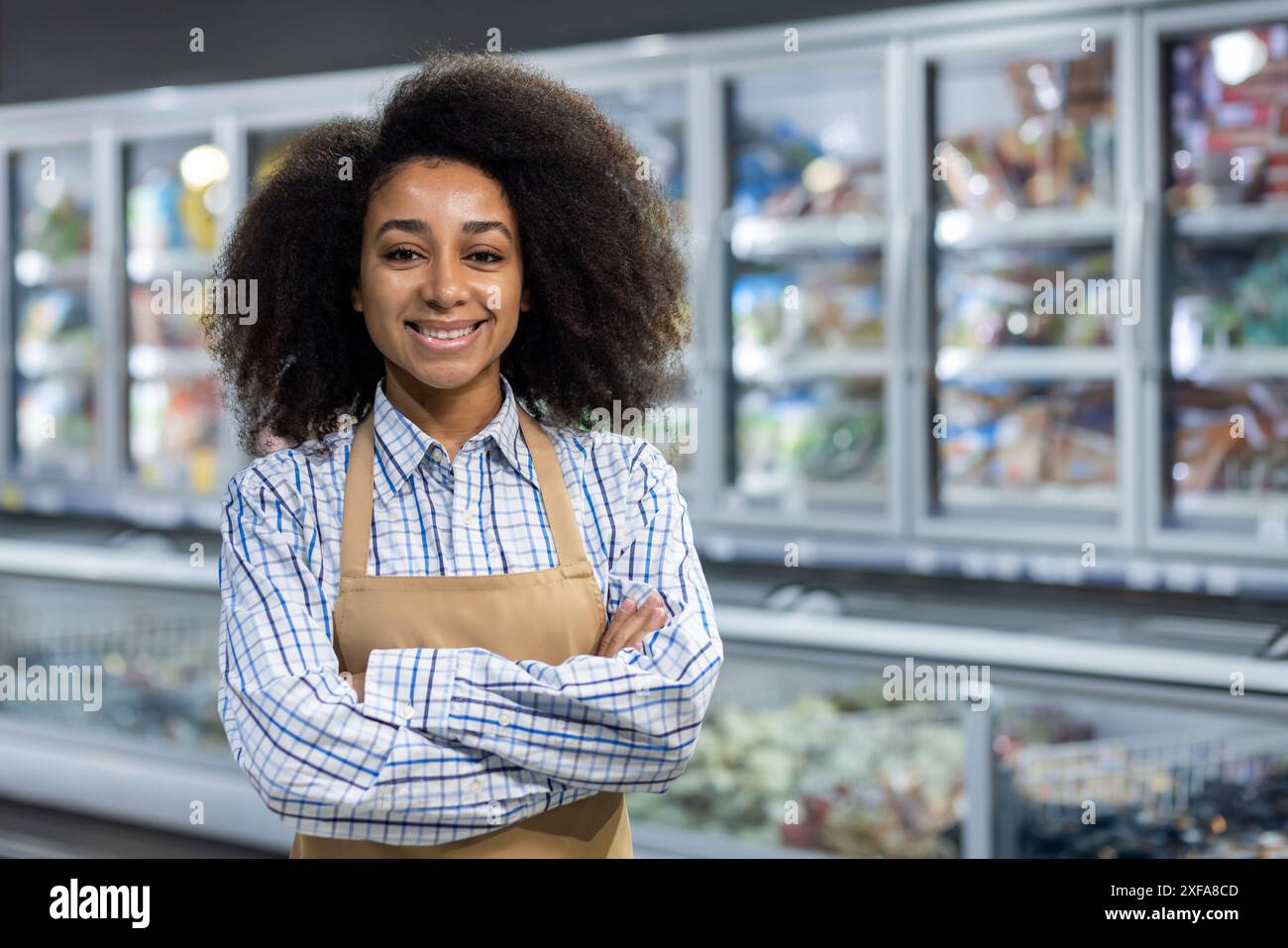Cheerful shopkeeper stands hi-res stock photography and images - Alamy