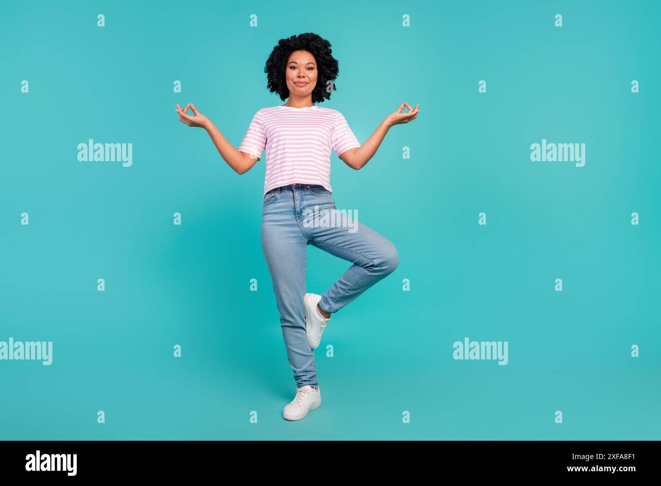 Photo of funky girl in pink t shirt and jeans stylish look ...