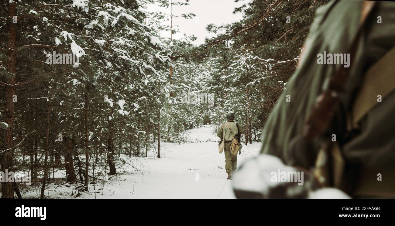 American Infantry Soldier Going Through Forest Road In Cold Winter Day ...