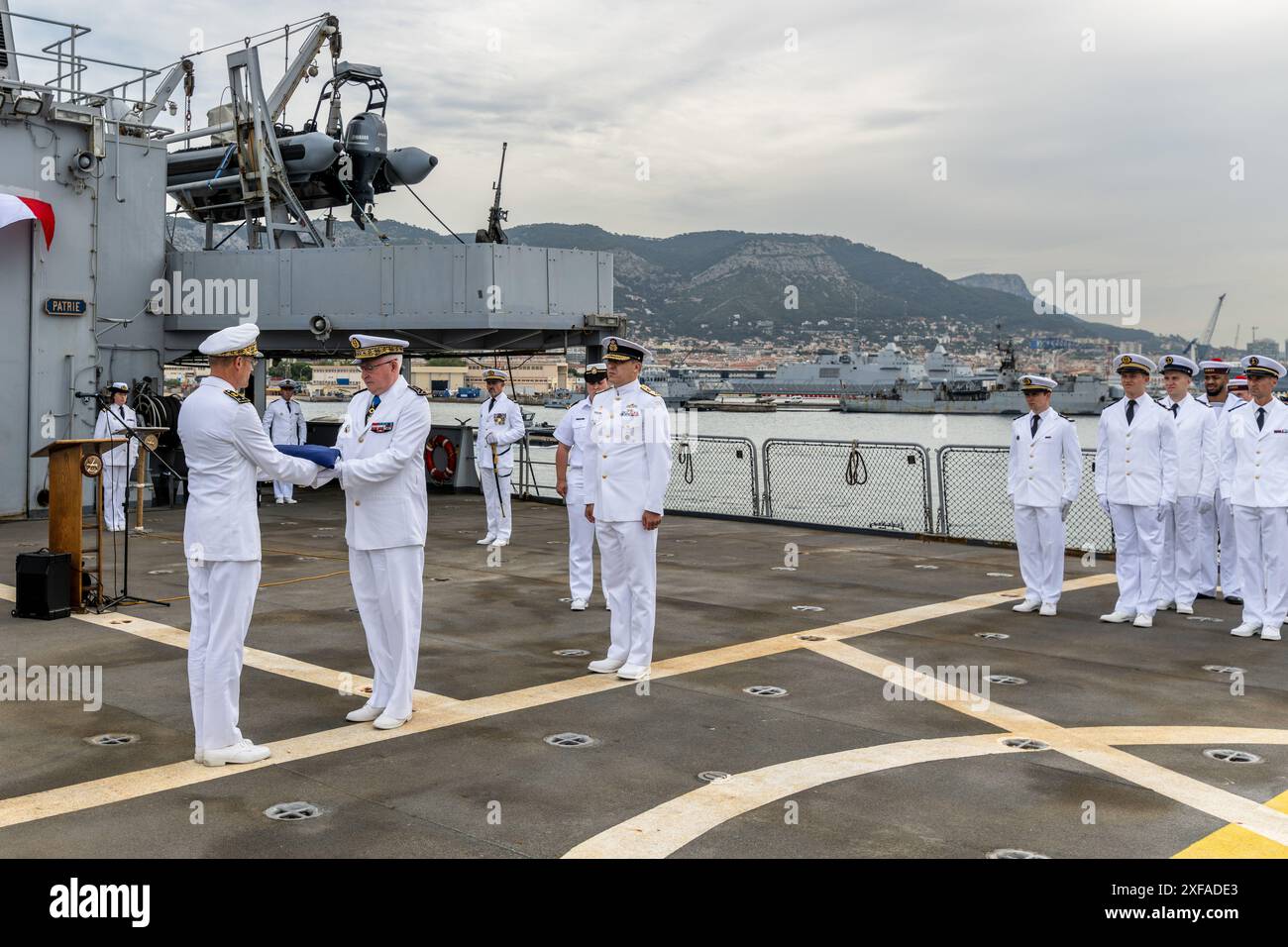 NATO flag handover ceremony between France and Canada. Command of NATO ...