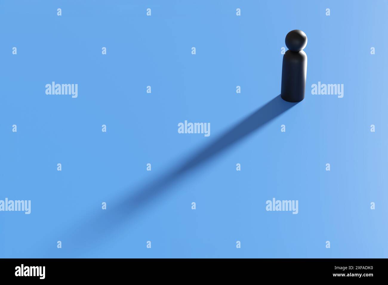 Black peg person doll model casting long shadow on a light blue ...