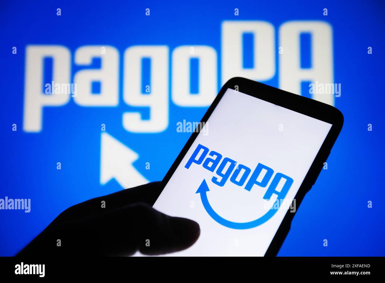 In this photo illustration, a PagoPA logo is seen on a smartphone and ...