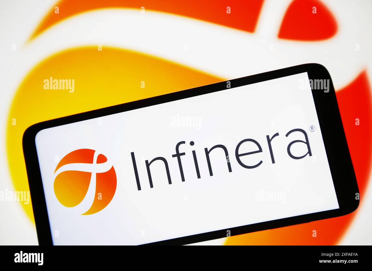 In this photo illustration, an Infinera Corporation logo is seen on a ...