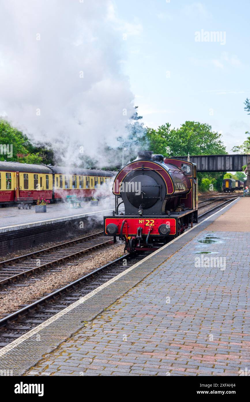 Historic, restored train steam arriving at Sheringham station - part of the North Norfolk ...