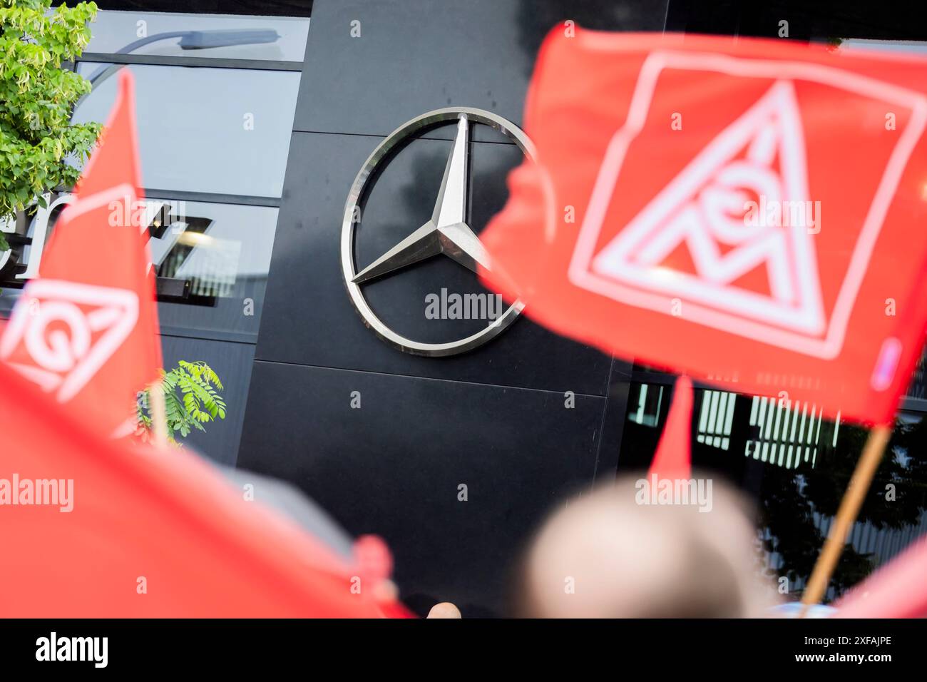 Berlin, Germany. 02nd July, 2024. IG-Metall flags are seen in front of ...