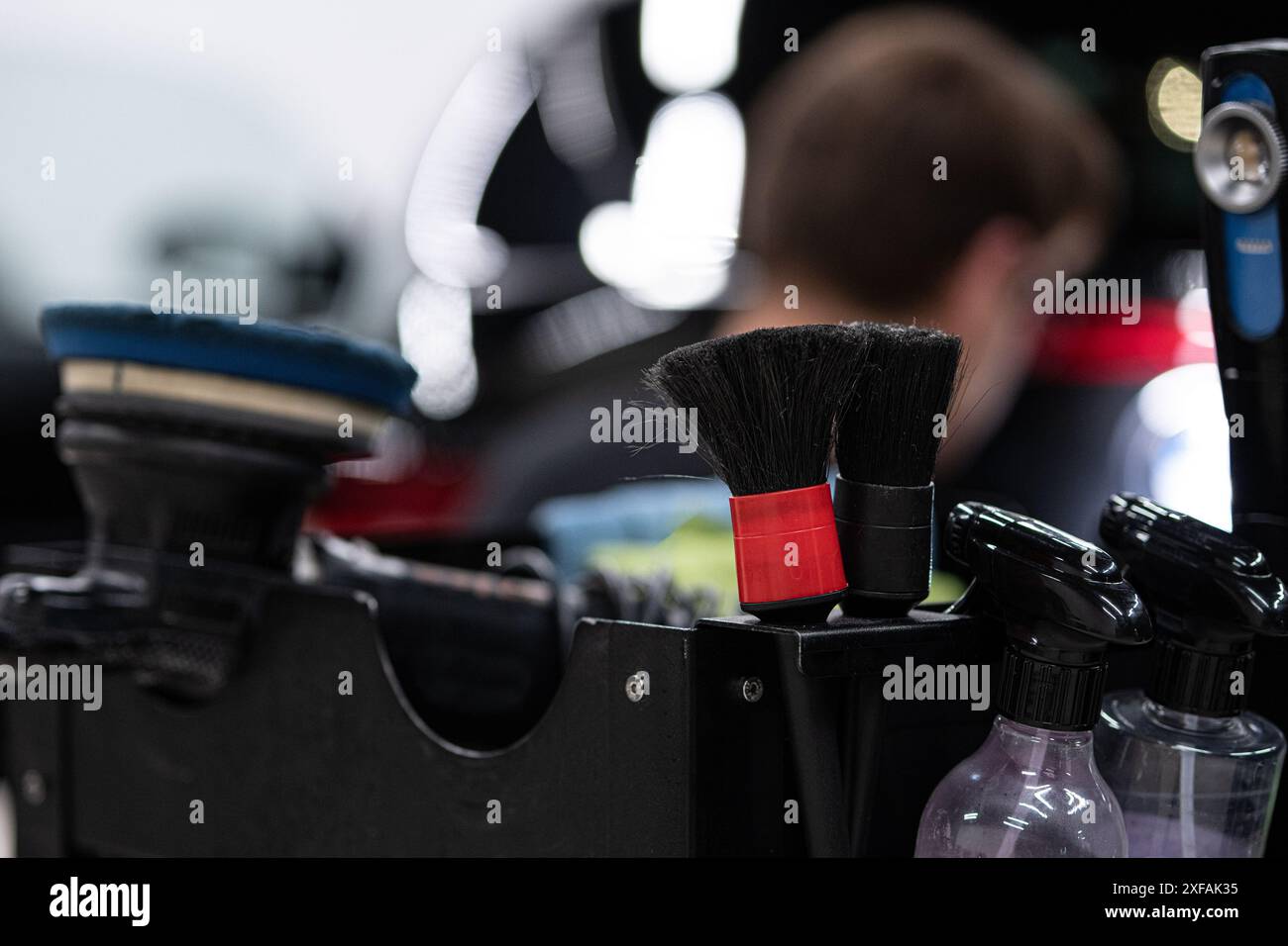 Tools and accessories used in car detailing electric polisher, brushes ...