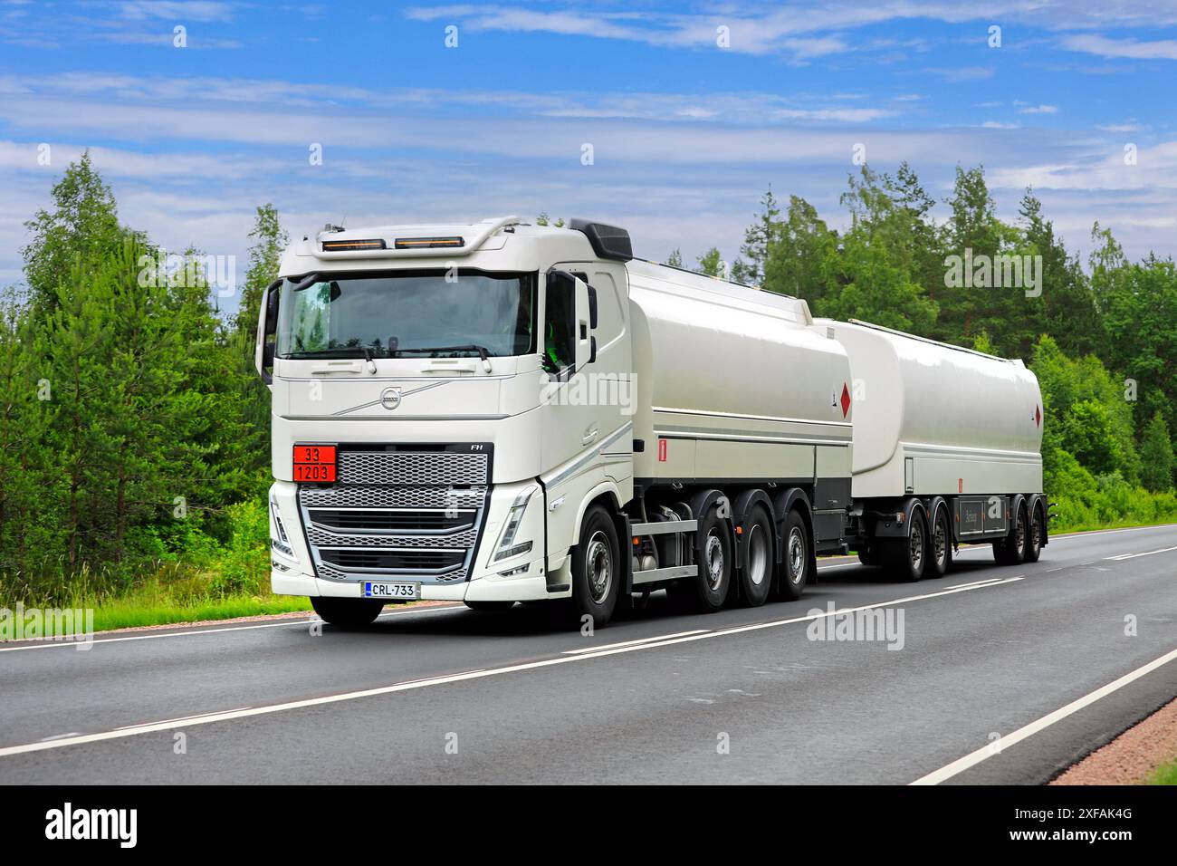 White Volvo FH tank truck transports gasoline fuel, ADR code 33-1203 ...