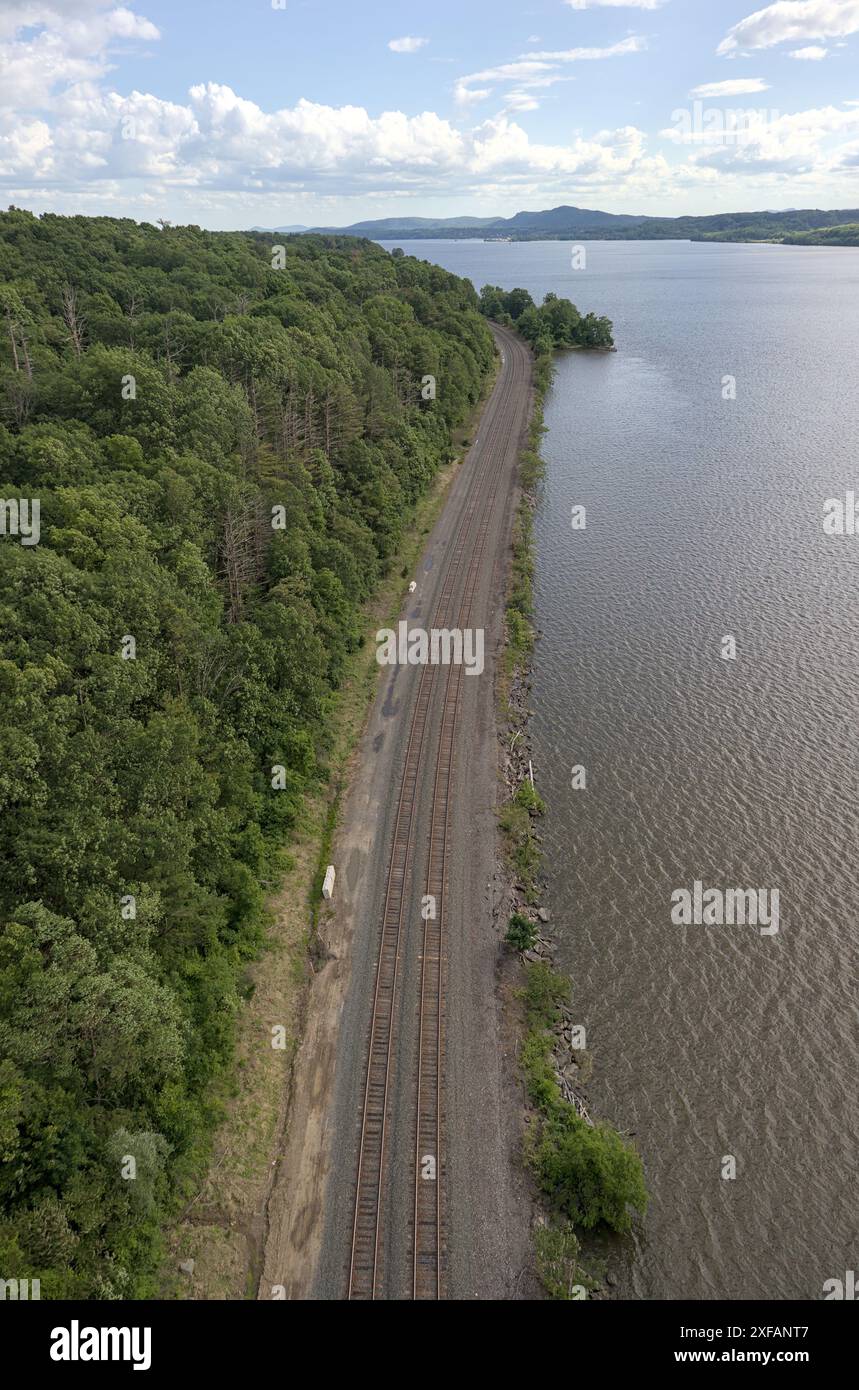 view of train tracks next to river from kingston rhinebeck bridge in ...