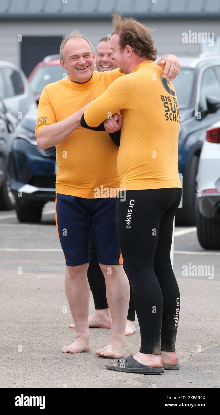 Liberal Democrat leader Sir Ed Davey (left) during a visit to Big Blue ...