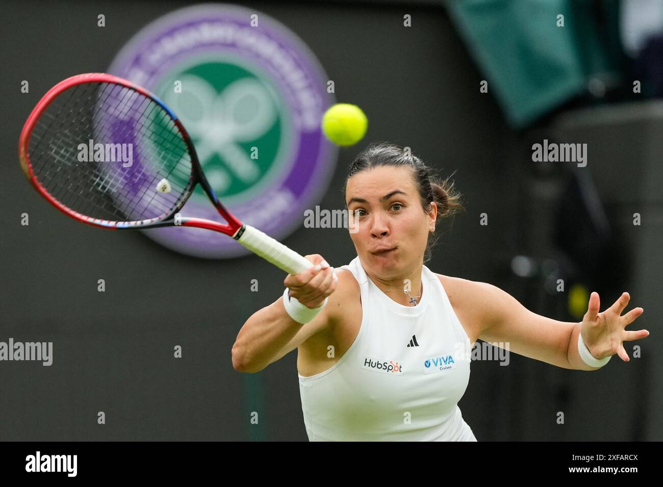 Elena-Gabriela Ruse of Romania plays a forehand return during her first ...