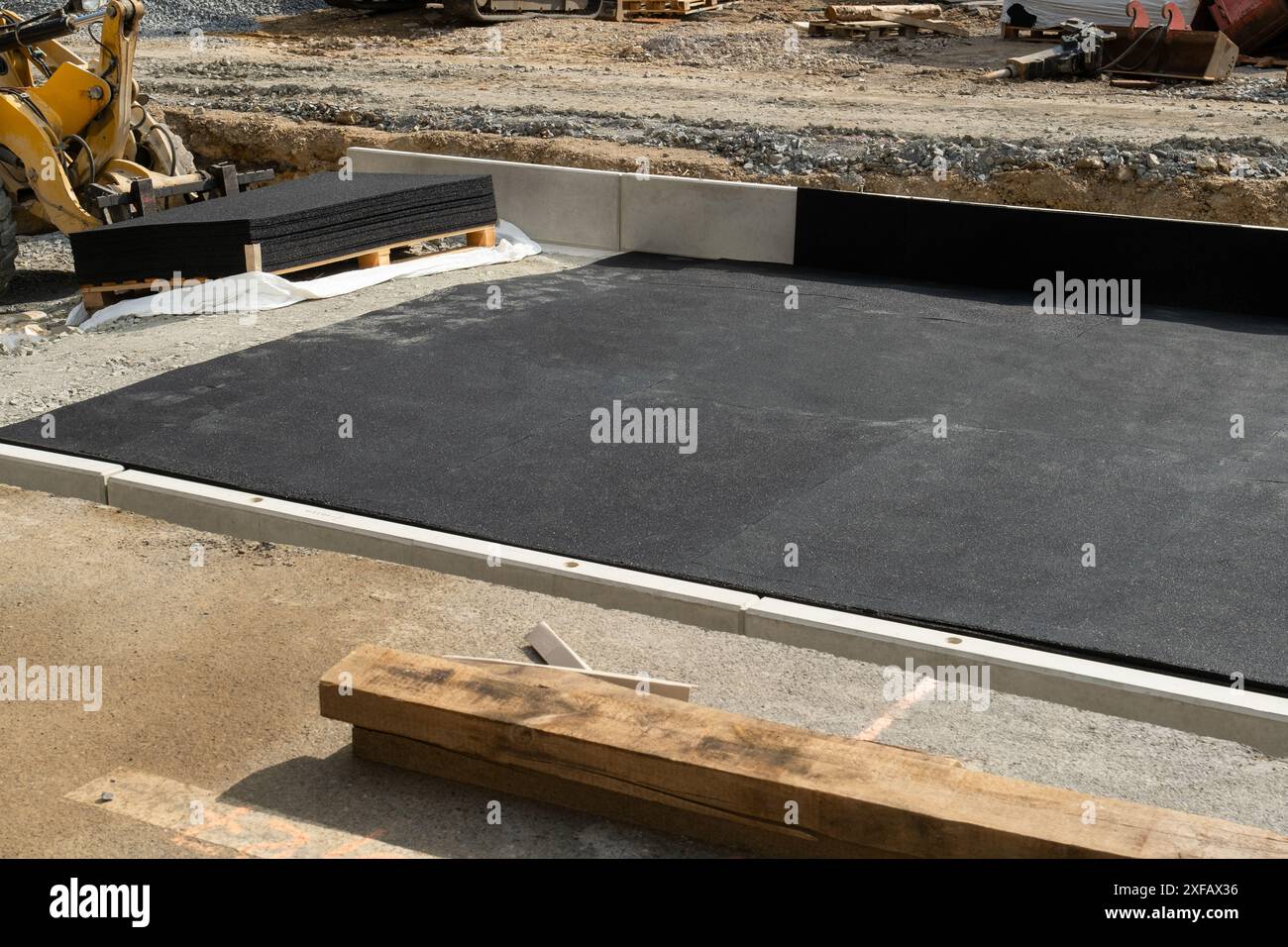 pneumatic pad at a construction site of tram tracks in a European city ...