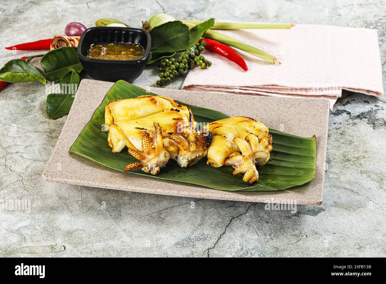 Delicous Grilled cuttlefish with sauce asian style Stock Photo - Alamy