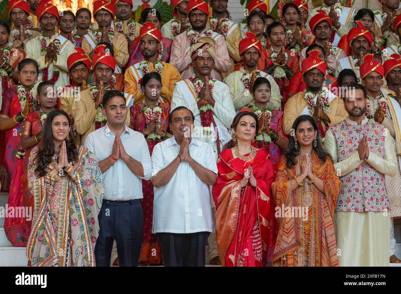 Chairman of Reliance Industries Limited Mukesh Ambani, third from left ...