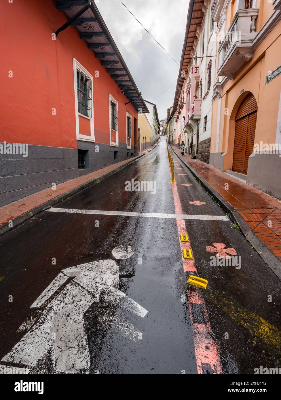 Narrow street in rain, Quito Old Town, Ecuador, South America Stock ...