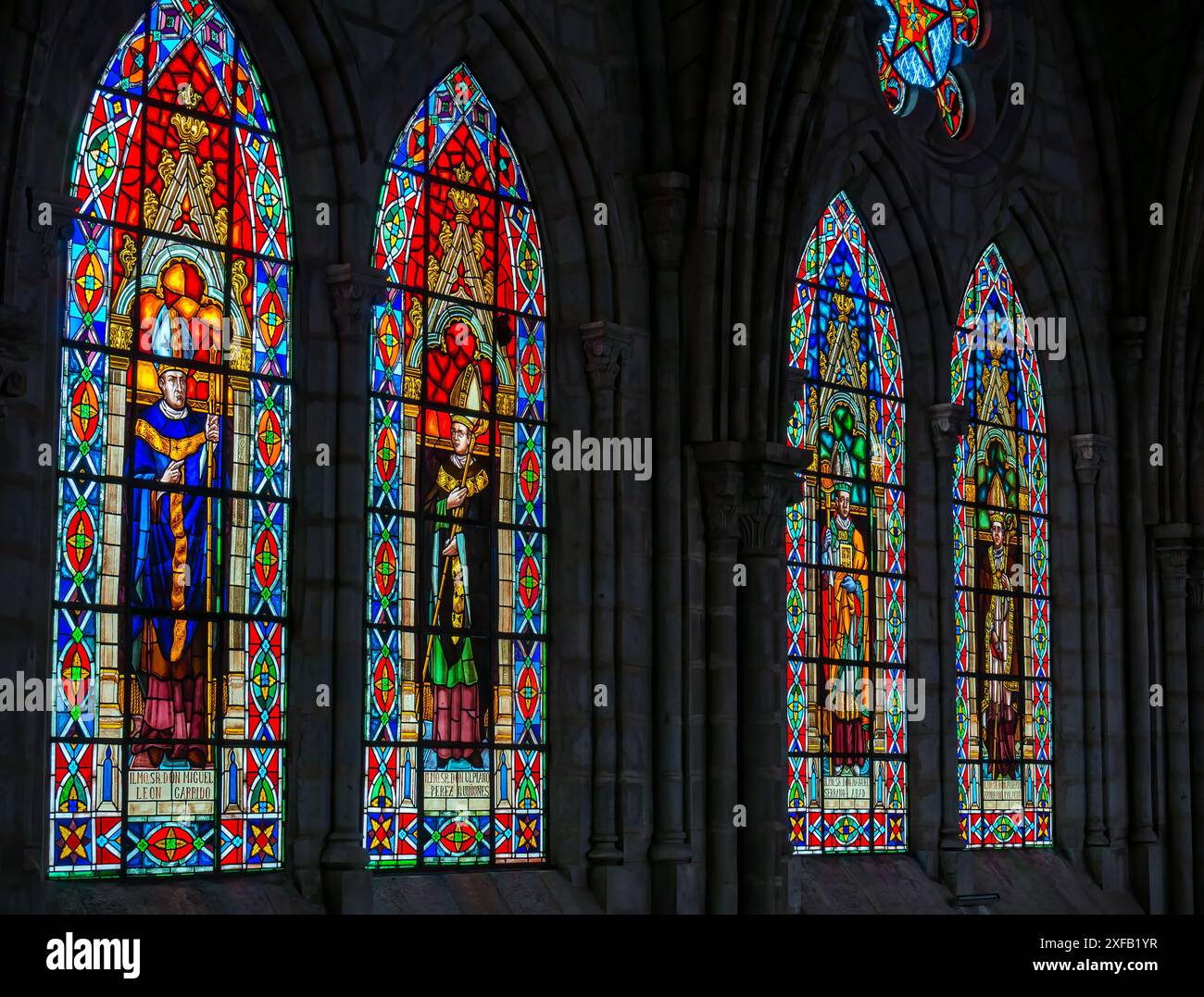 Interior stained glass window depicting religious figures of Basilica ...