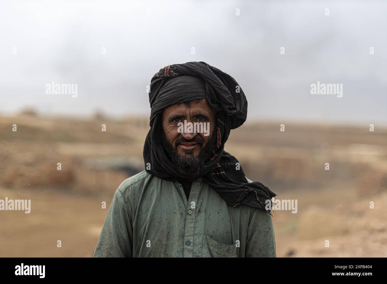Portrait of 50-year-old Ghulam Mohammad who works in a brick kiln Stock ...