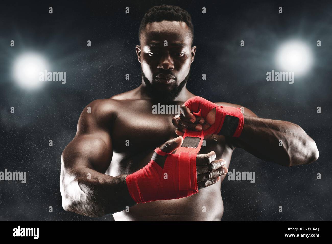 Boxer Wrapping Hands in Ring Stock Photo - Alamy