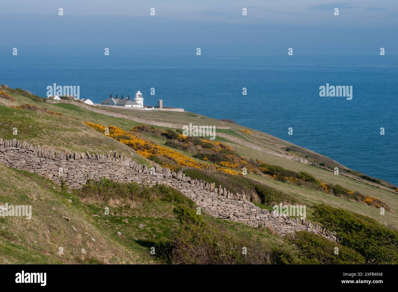 The Purbeck Hills meet the English Channel at the lighthouse on Anvil ...