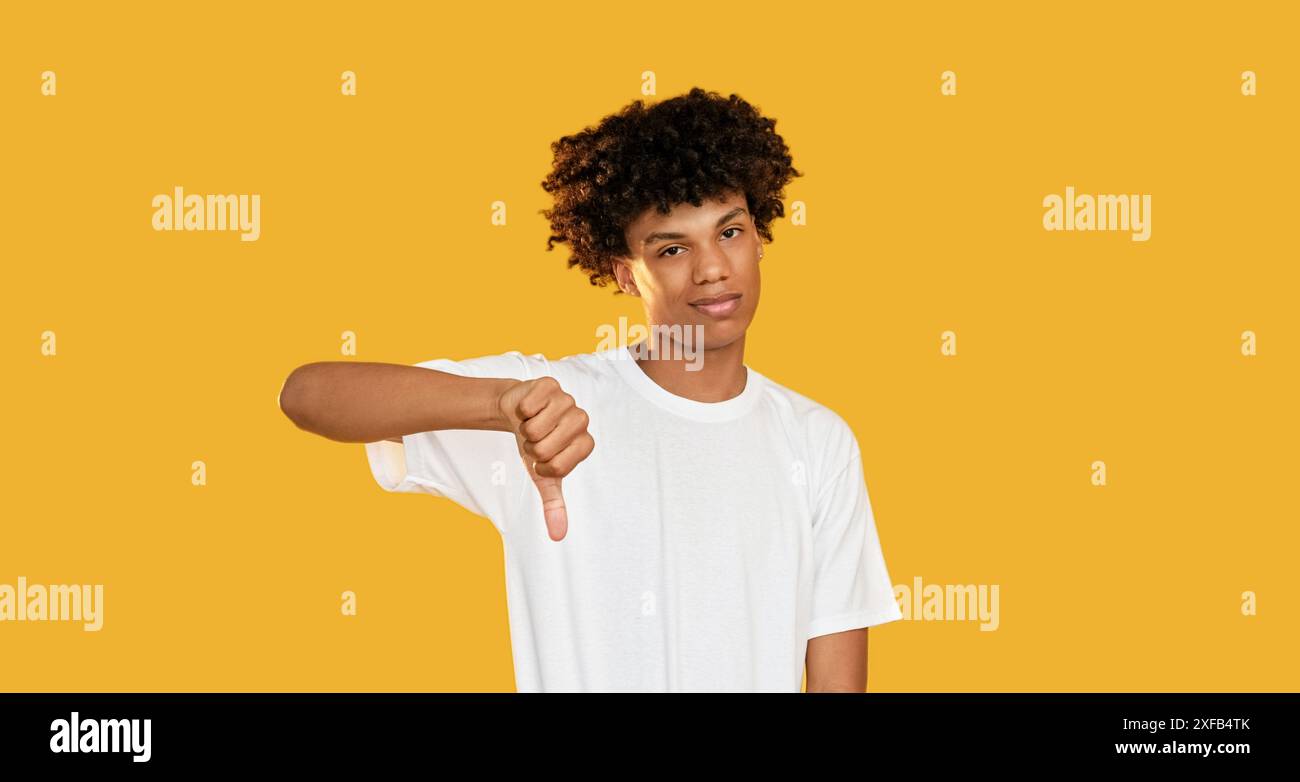 Dislike gesture. Negative feedback. Dissatisfied guy expressing ...