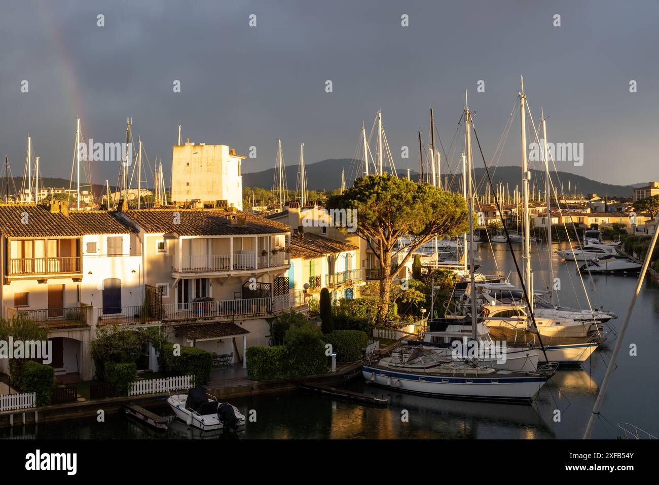 Port Grimaud, marina in France with yachts and sailboats with evening ...