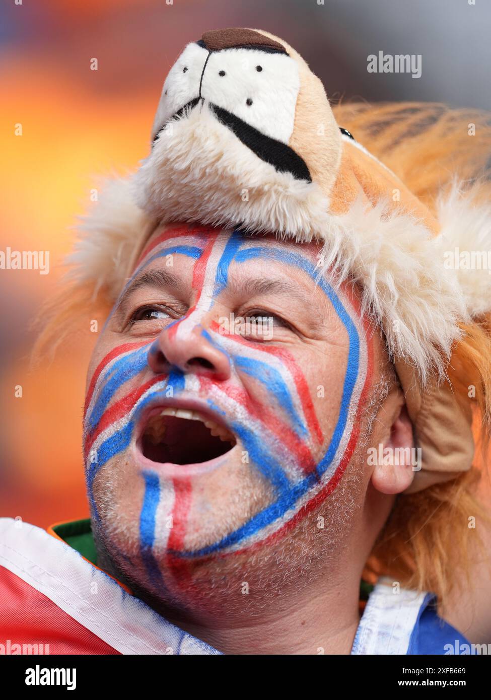 A Netherlands fan wearing face paint ahead of the UEFA Euro 2024, round ...