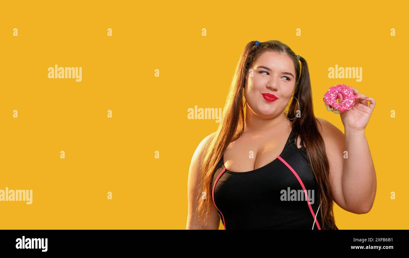 Sweet pastries. Pink yummy. Diet problem. Cute curvy overweight woman ...