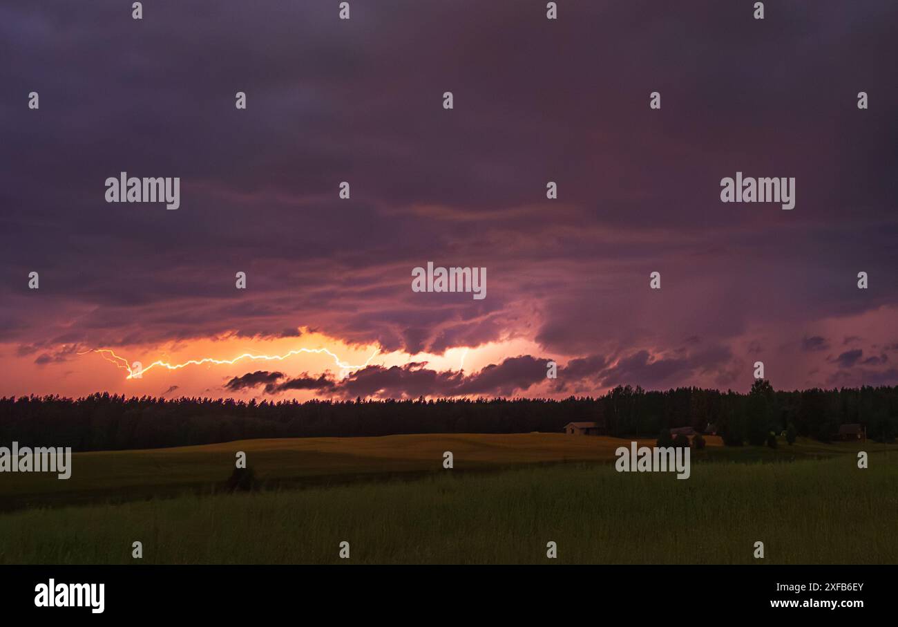 Dazzling lightning display brightening the nighttime with vibrant bolts ...
