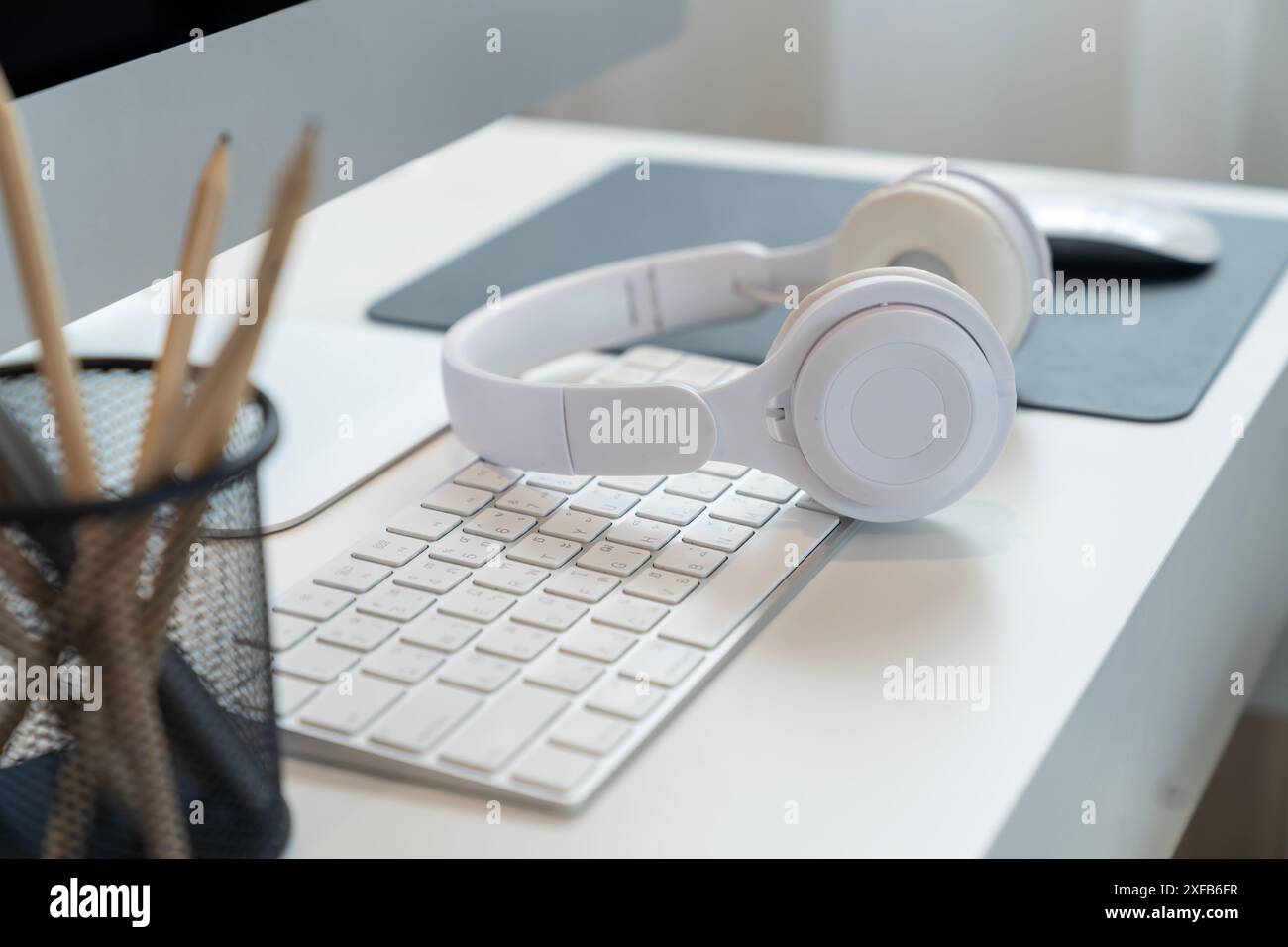 Bluetooth headphones on computer hi-res stock photography and images ...