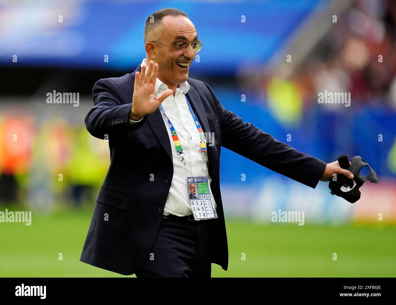 France Liaison and security officer Mohamed Sanhadji holding a ...