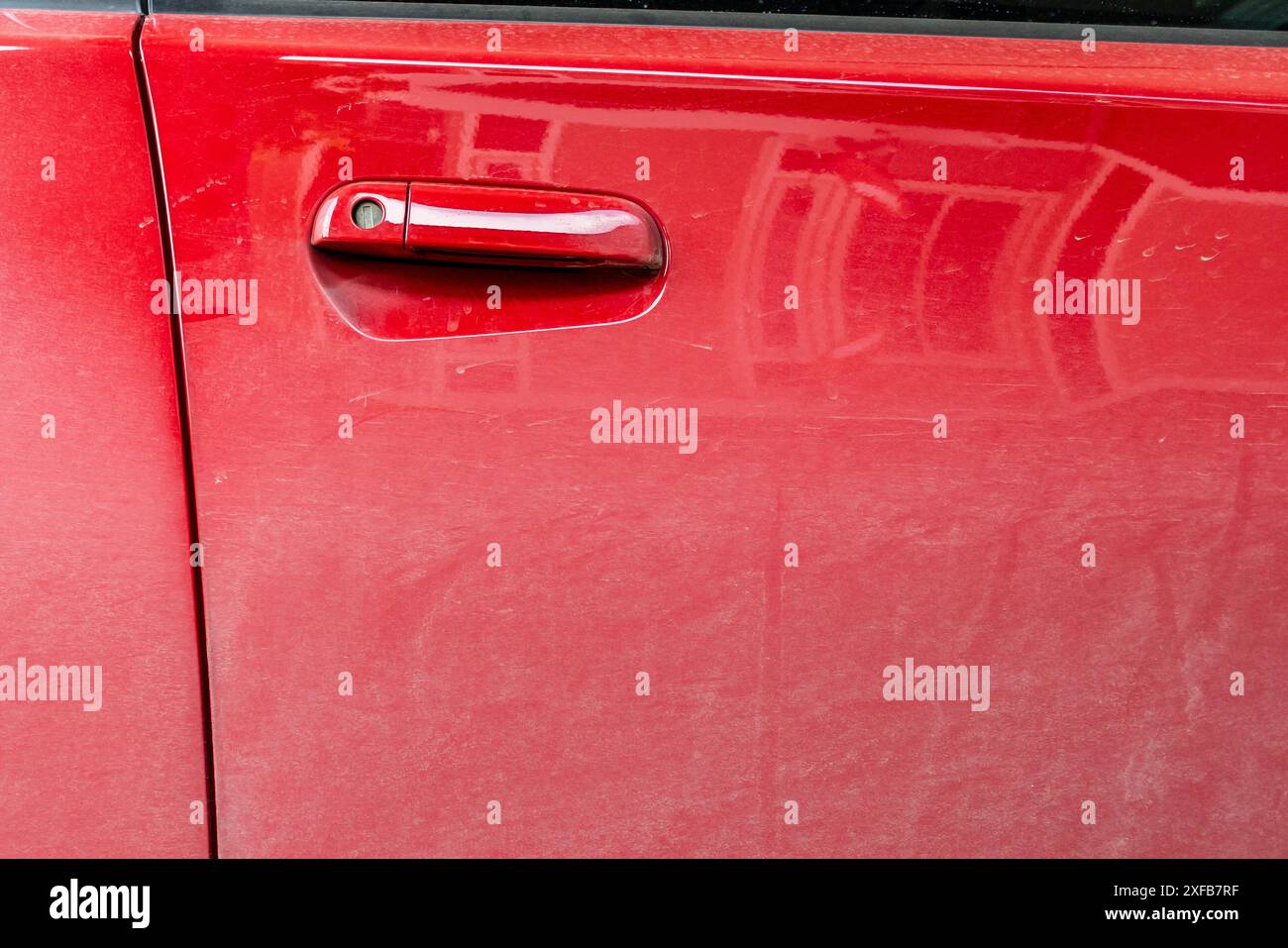 Dirty red car Stock Photo - Alamy