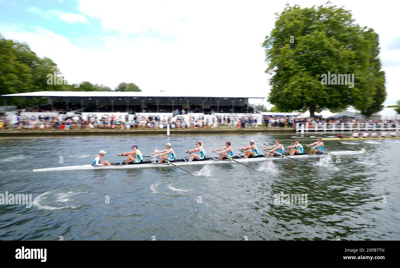 A crew from Edinburgh University make their way towards the finish line ...