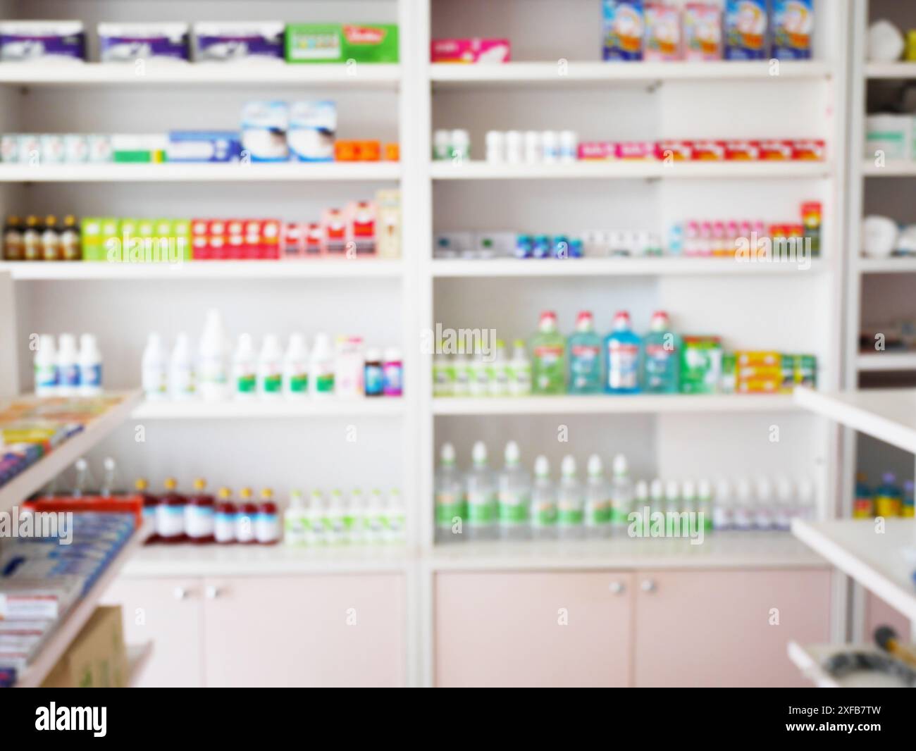pharmacy store with blur medicines arranged on shelves Stock Photo - Alamy