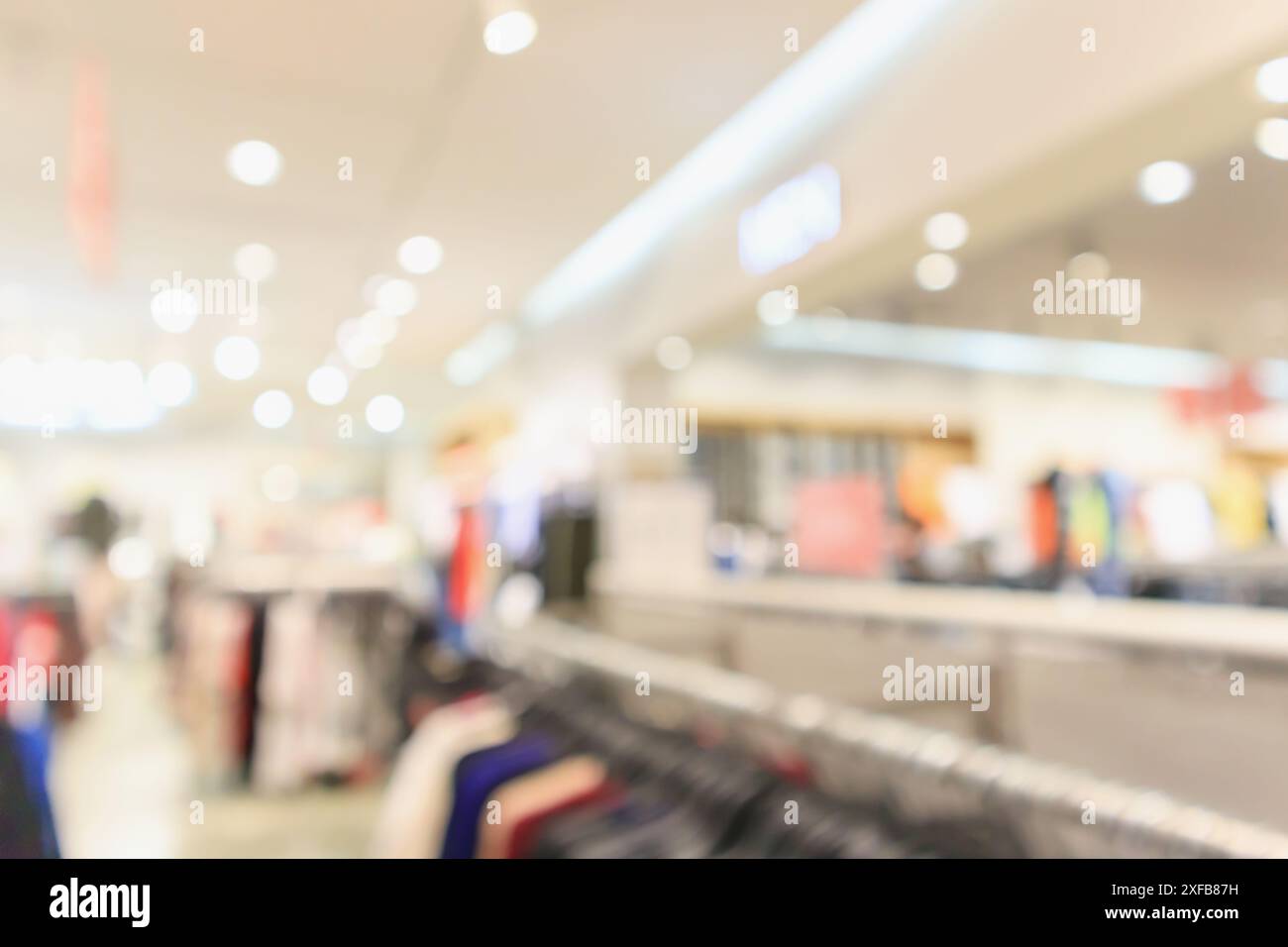 Abstract blur clothing boutique store display interior of shopping mall ...