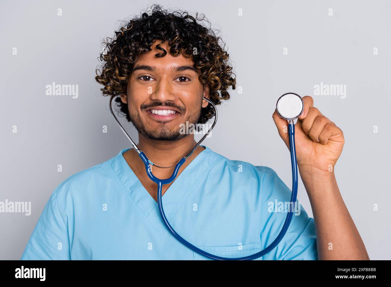 Photo of doctor guy use stethoscope check up isolated grey color ...