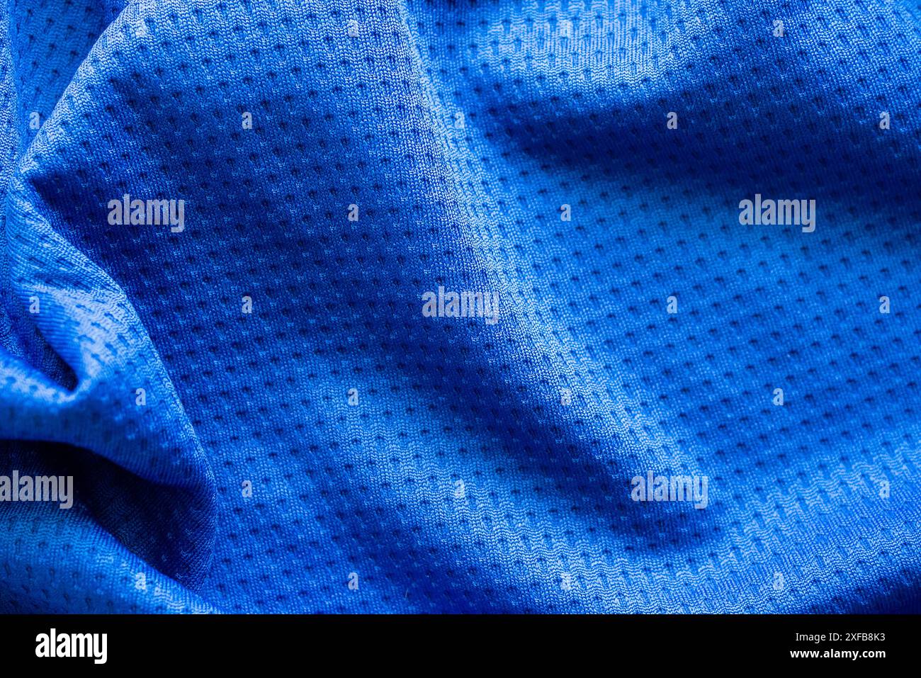 Blue color fabric sport clothing football jersey with air mesh texture ...