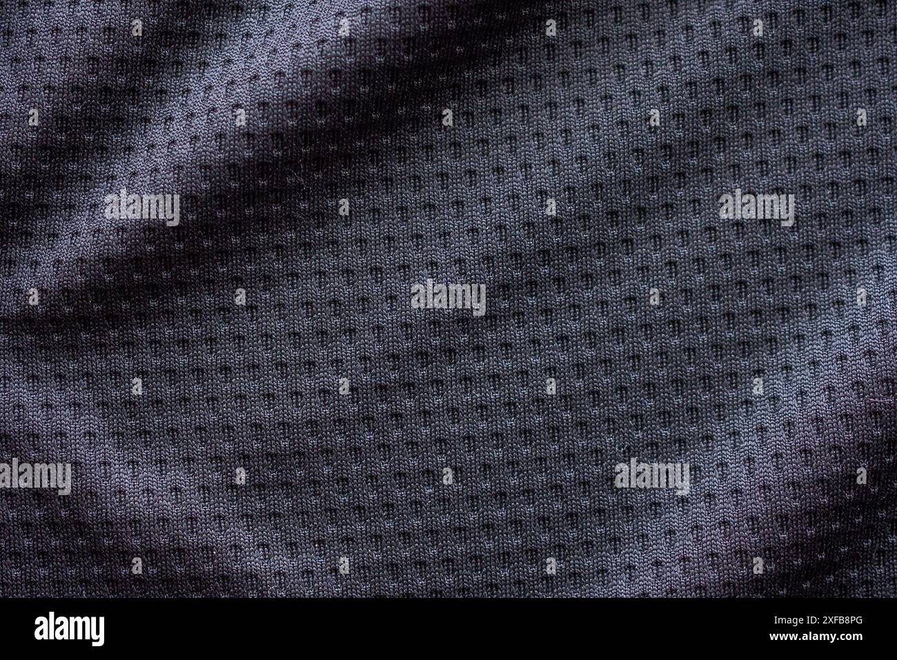 Black fabric sport clothing football jersey with air mesh texture ...