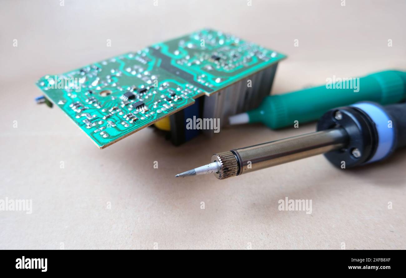 Worker soldering electronic components hi-res stock photography and ...