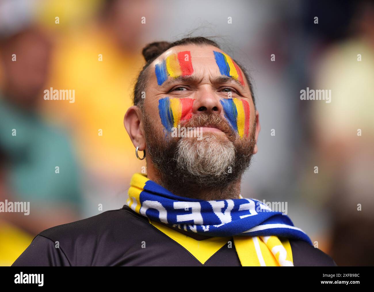 A Romania fan in the stands ahead of the UEFA Euro 2024, round of 16 ...