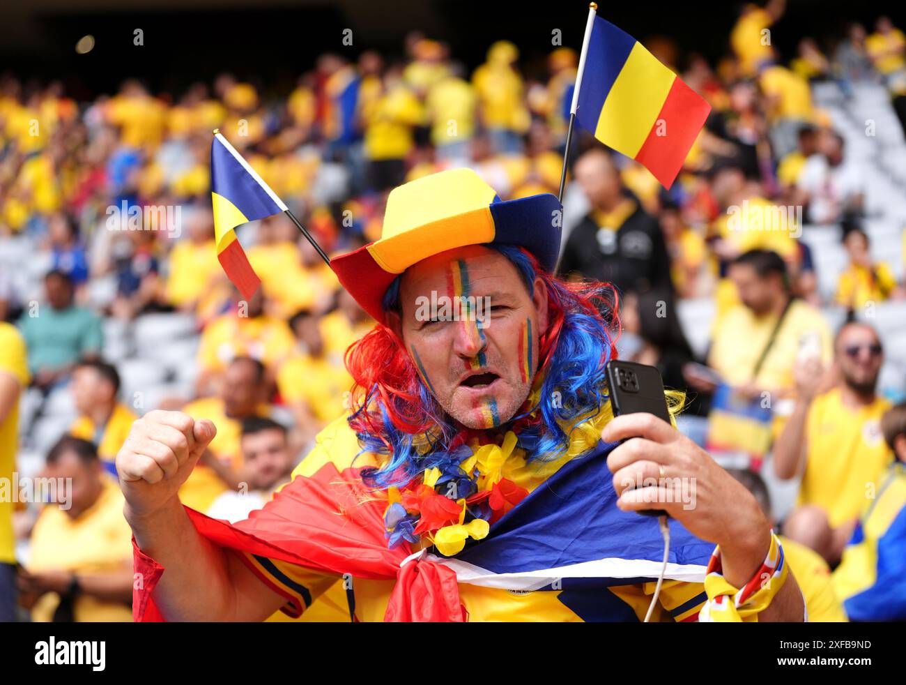 A Romania fan in the stands ahead of the UEFA Euro 2024, round of 16 ...