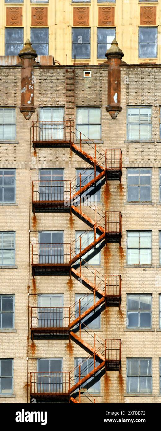 Historic building in downtown Memphis, Tennessee has an old fire escape ...