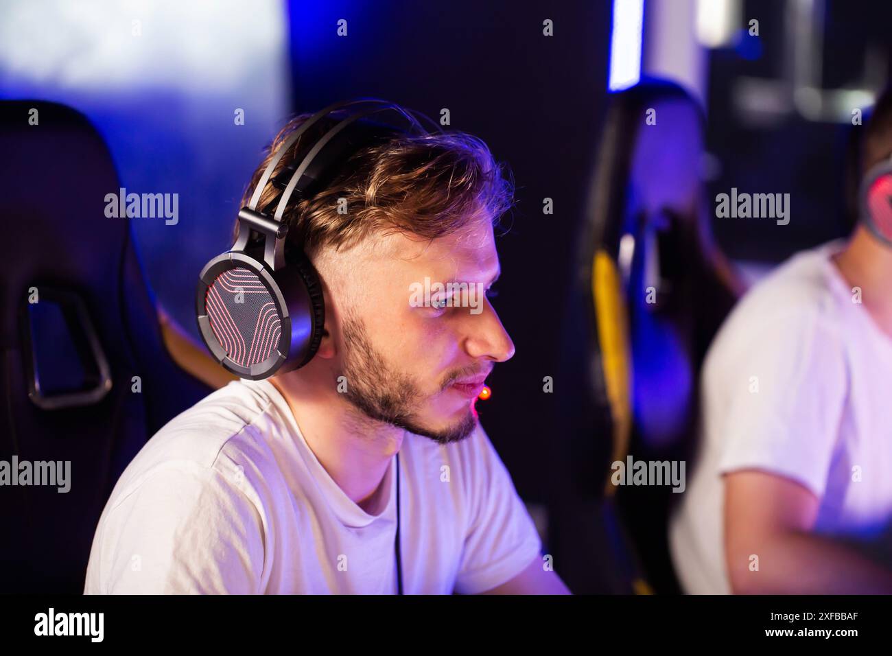 Gamer plays multiplayer match in hi-res stock photography and images ...