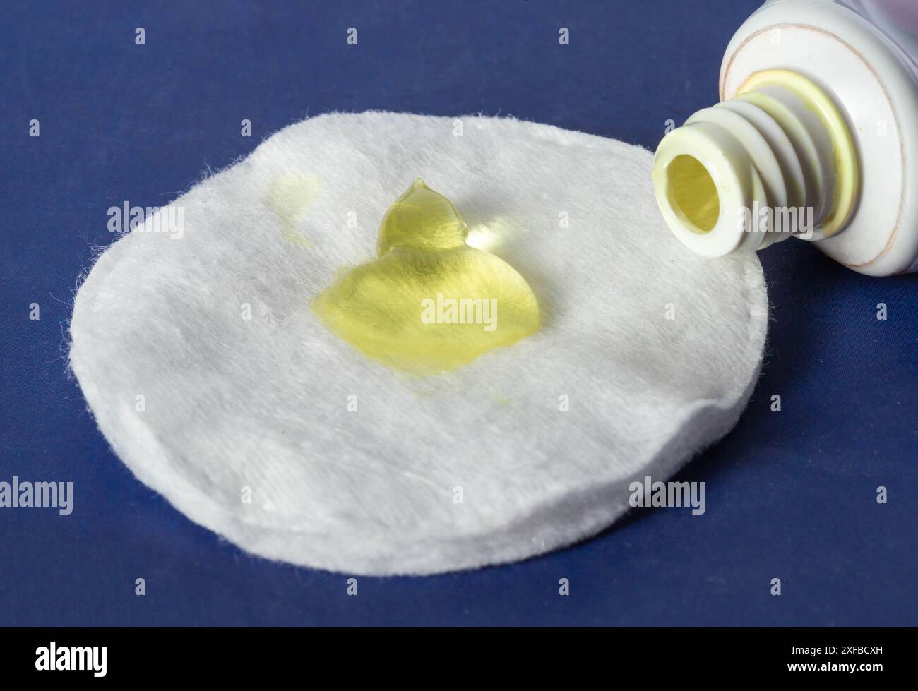 Therapeutic yellow cream ointment is squeezed out of the tube onto a ...